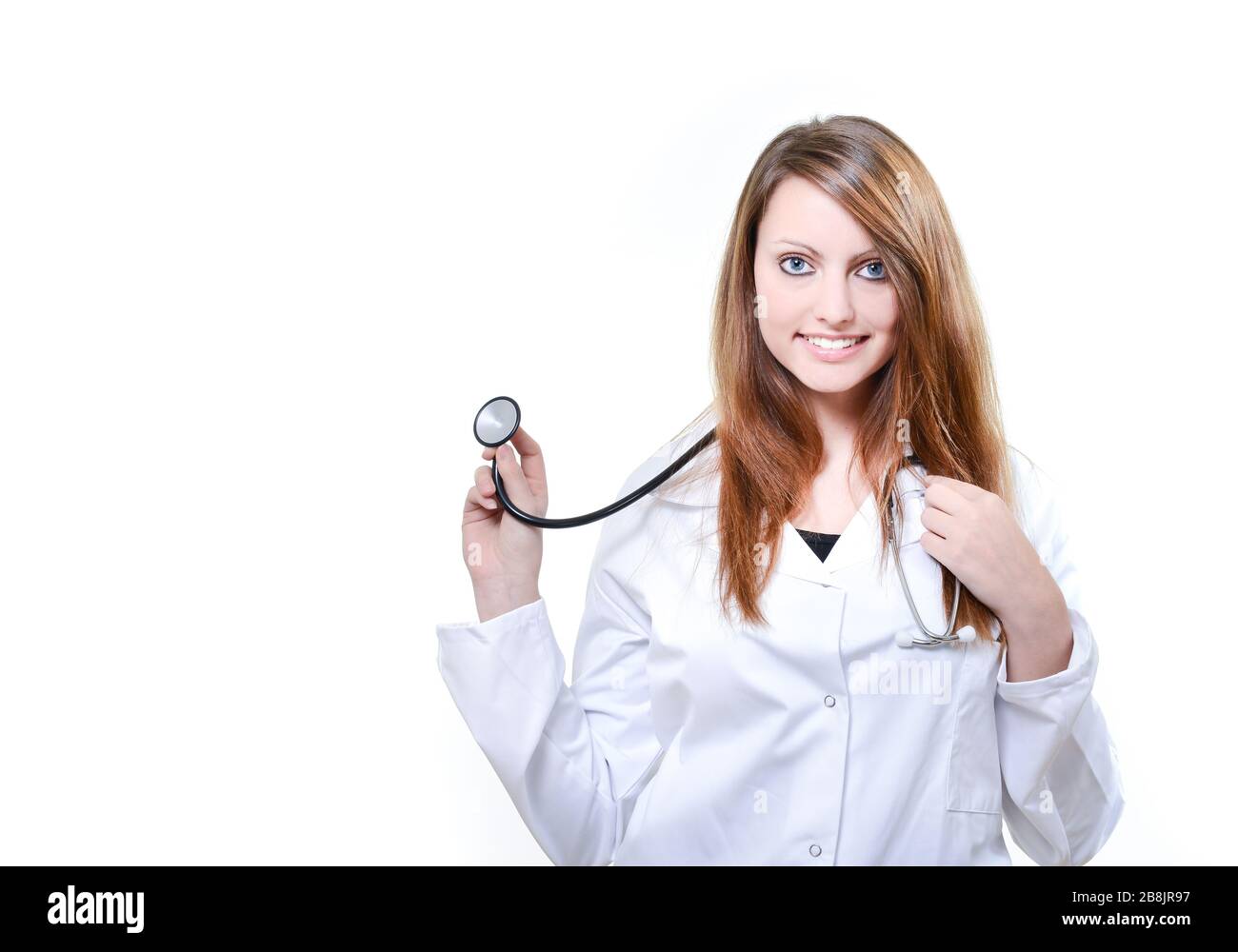 Pretty female doctor isolated over a white background Stock Photo - Alamy