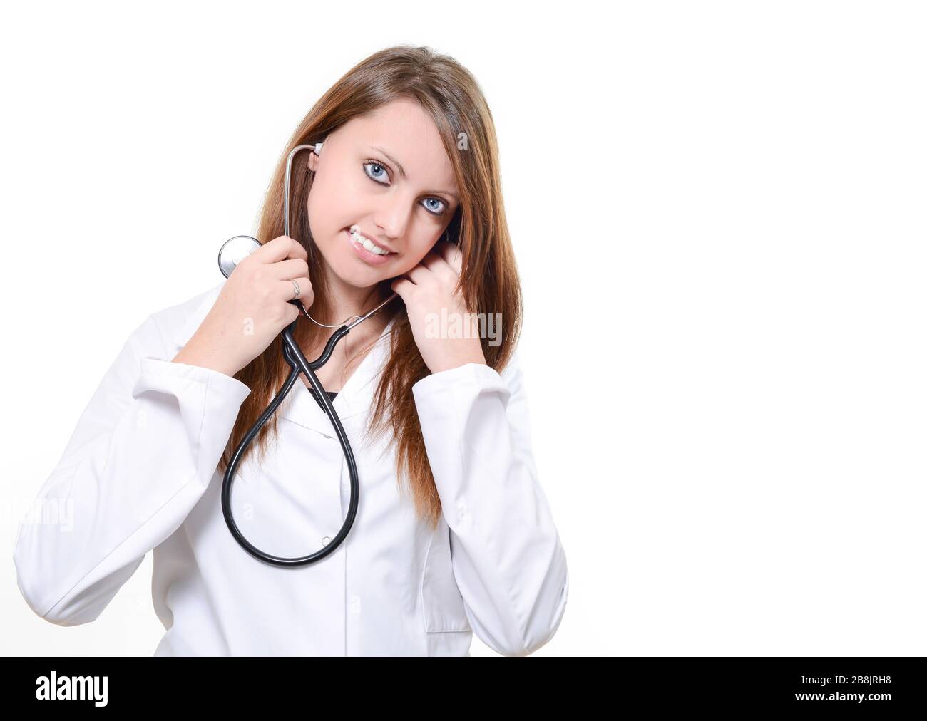 Pretty female doctor isolated over a white background Stock Photo - Alamy