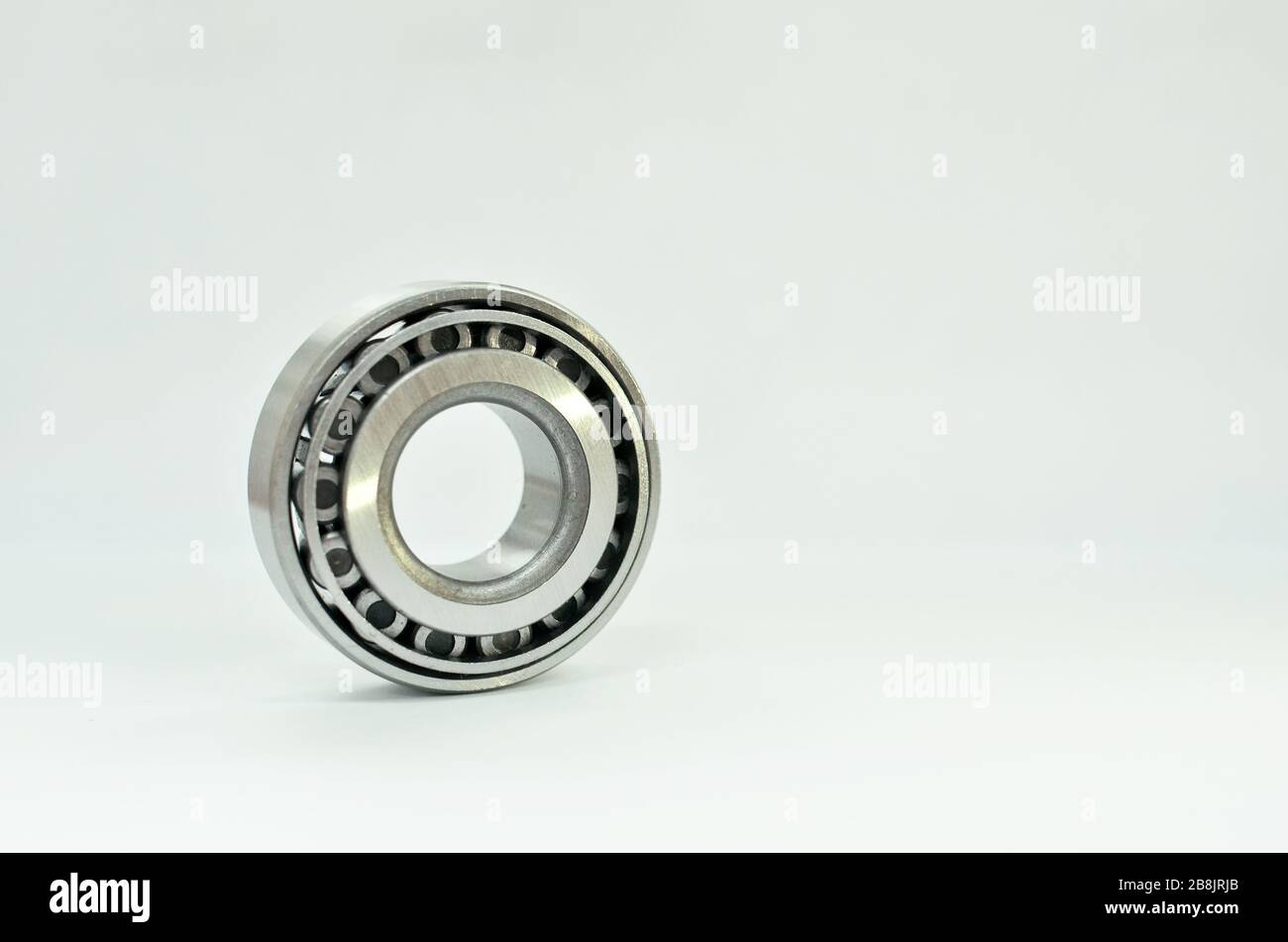 Bearing isolated in white background Stock Photo - Alamy