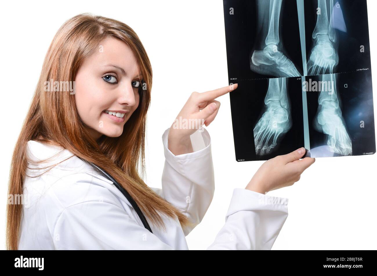female doctor with x-ray in hand over a white background Stock Photo ...