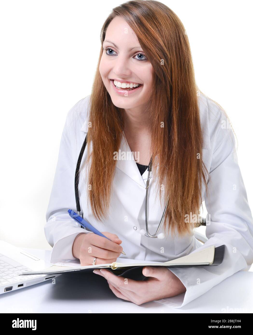 Pretty female doctor isolated writing on schedule Stock Photo - Alamy