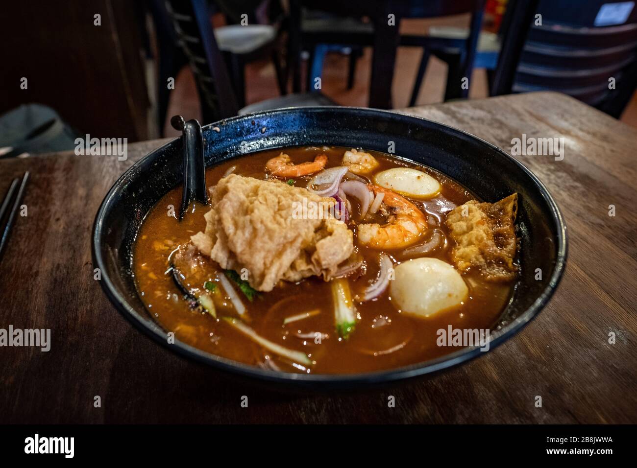 Bowl of Asam Laksa, a famous dish in Malacca, Malaysia Stock Photo - Alamy