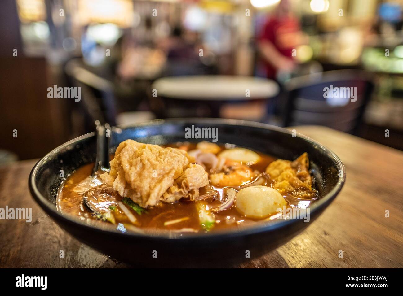 Bowl of Asam Laksa, a famous dish in Malacca, Malaysia Stock Photo - Alamy
