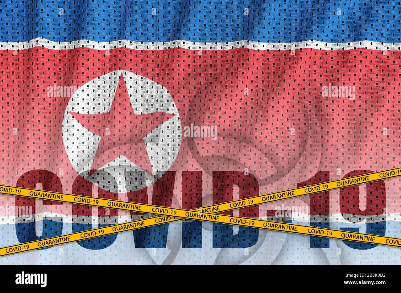 North Korea flag and Covid-19 inscription with orange quarantine border ...
