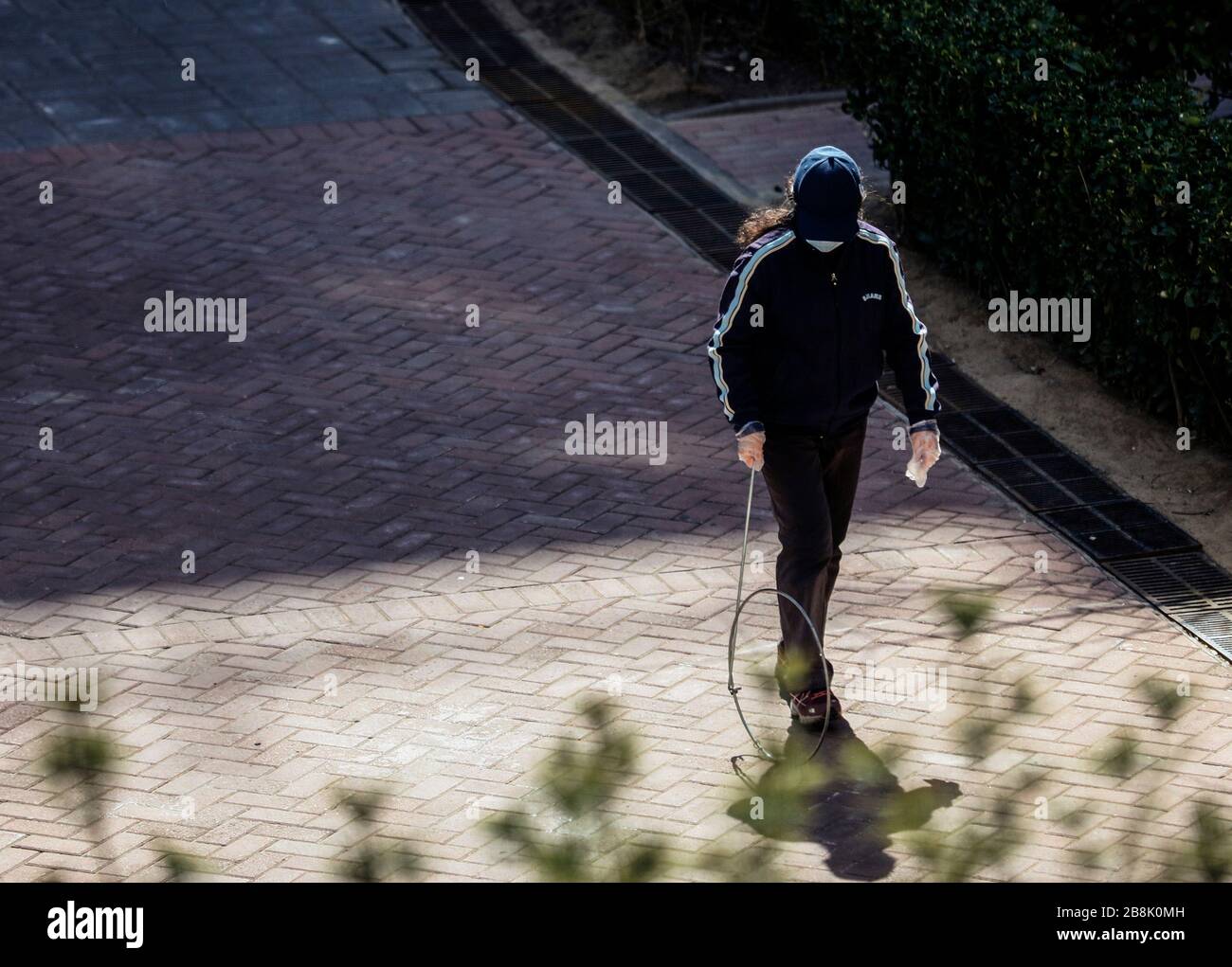Rolling hoop hi-res stock photography and images - Alamy