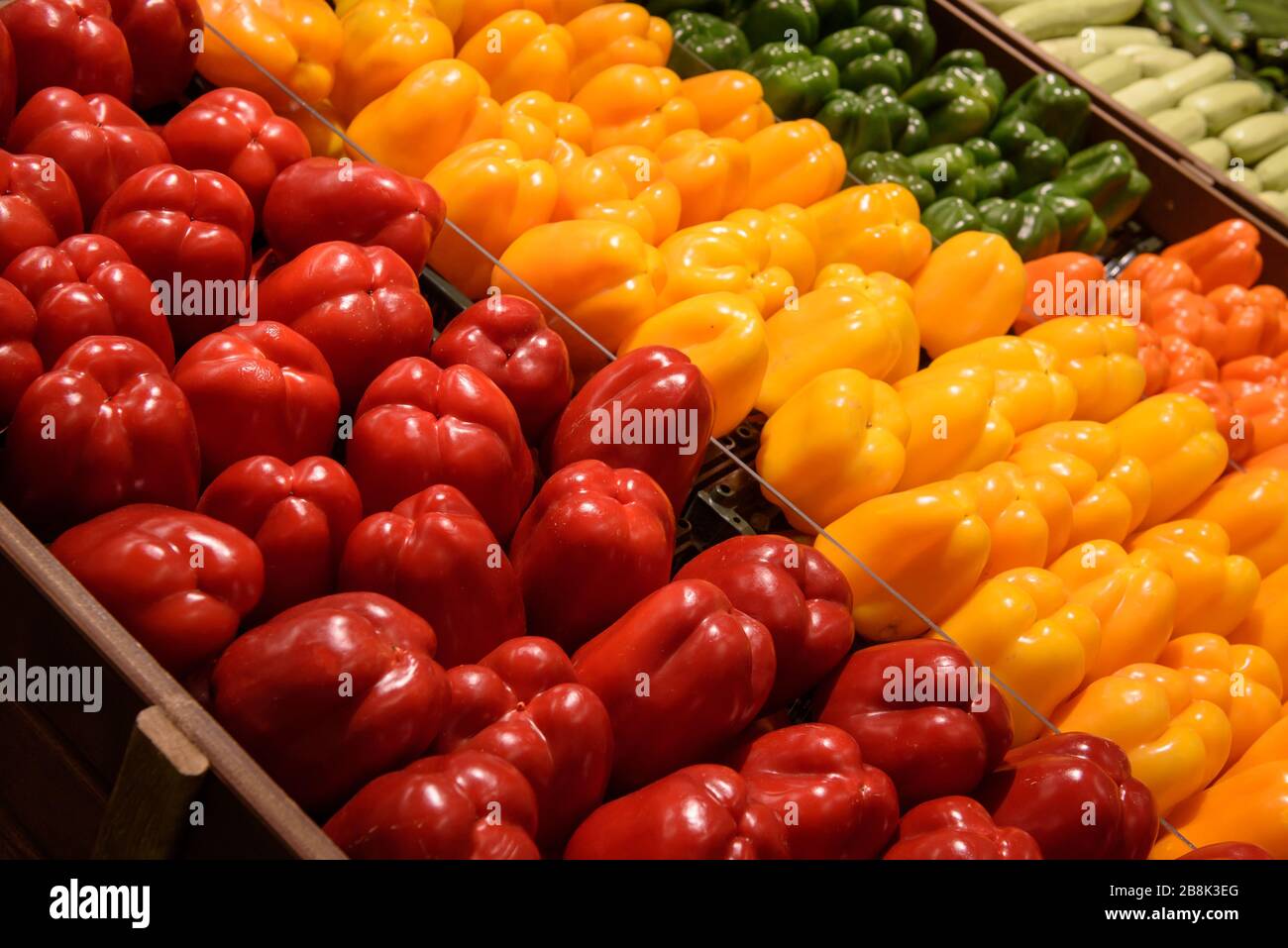 Sweet peppers at boxes in supermarket Stock Photo - Alamy