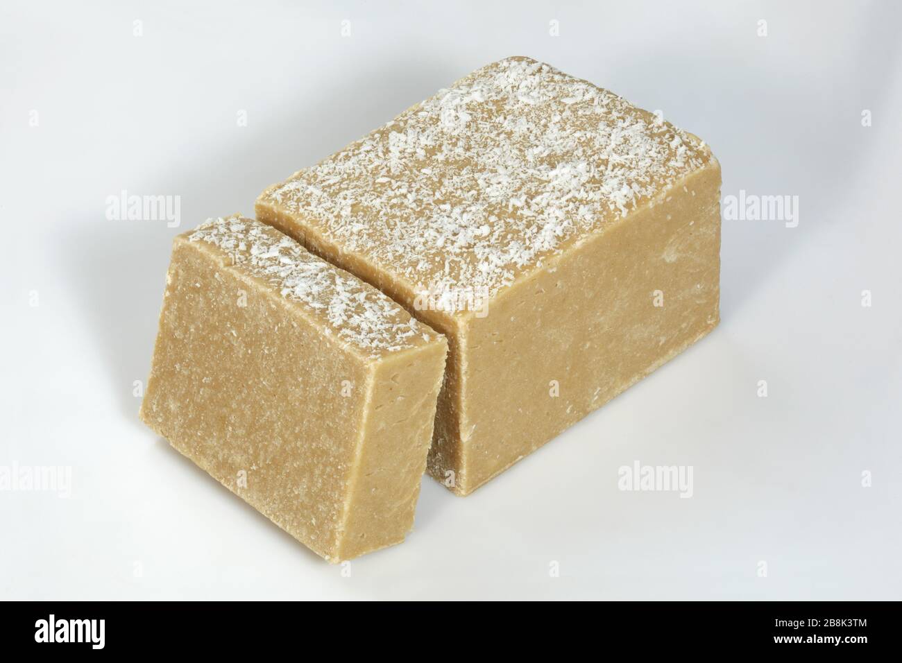 halva with walnut on white Stock Photo - Alamy