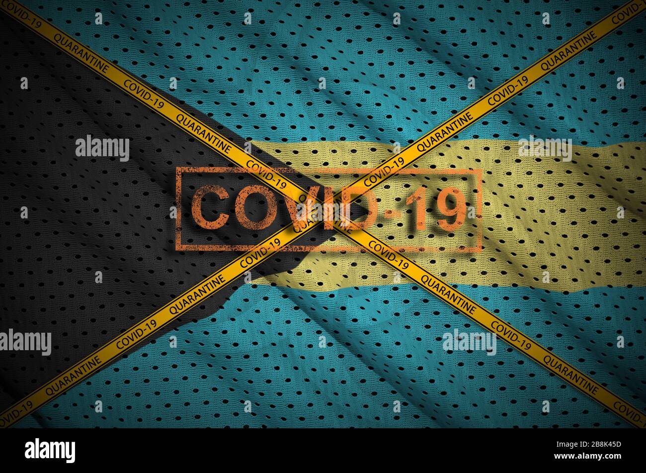 Bahamas flag and Covid-19 stamp with orange quarantine border tape ...