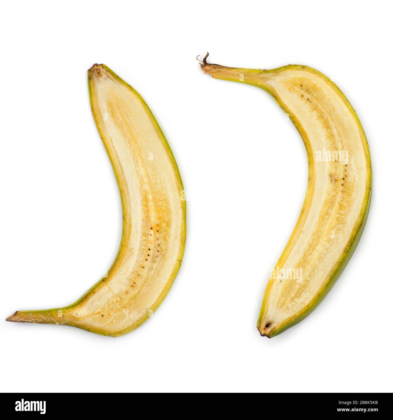 Decaying banana slices against white background Stock Photo - Alamy