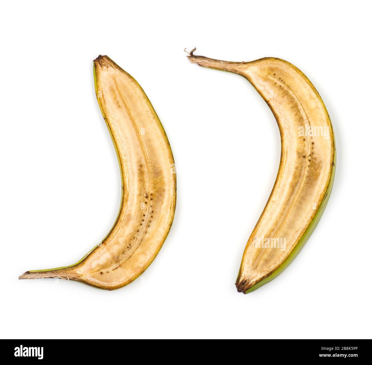 Decaying banana slices against white background Stock Photo - Alamy