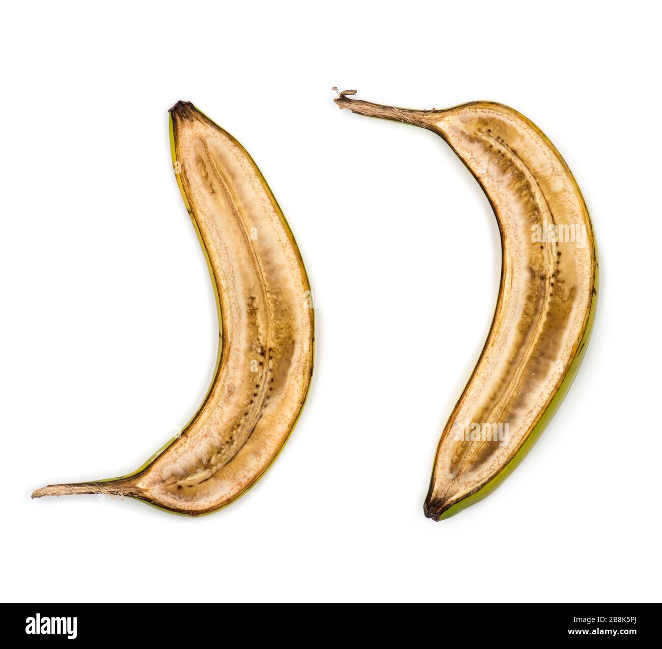 Decaying banana slices against white background Stock Photo - Alamy