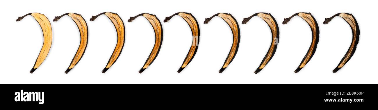 Decaying banana slices against white background Stock Photo - Alamy