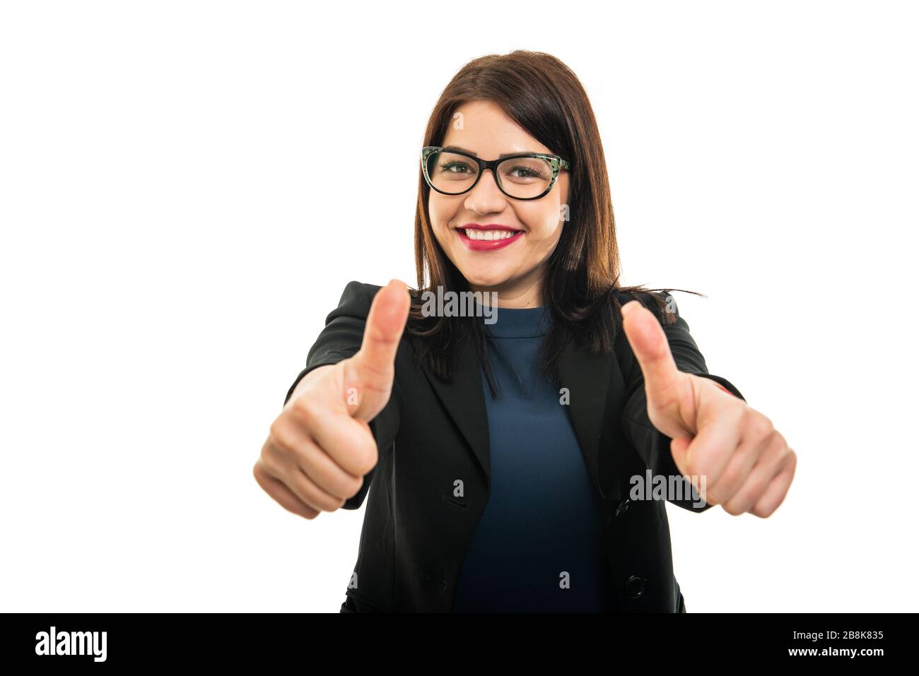 Portrait of young business girl wearing glasses showing double like ...