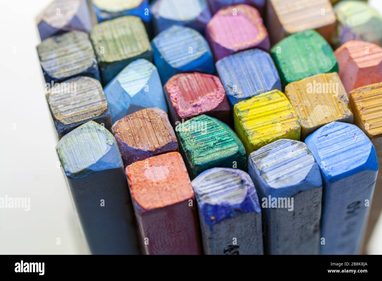 Colourful crayons on white background Stock Photo - Alamy