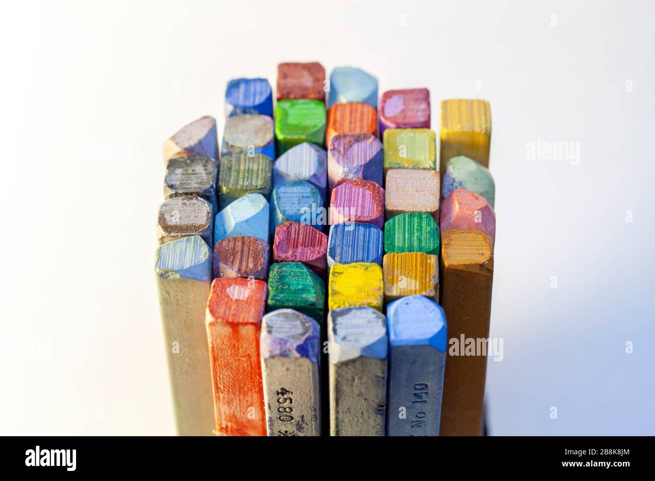 Colourful crayons on white background Stock Photo - Alamy