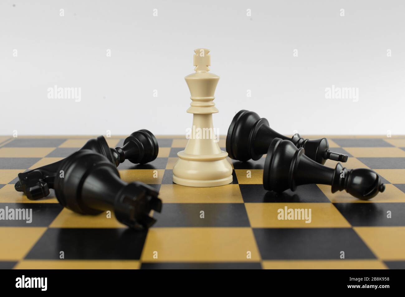 White king won black figures Stock Photo - Alamy