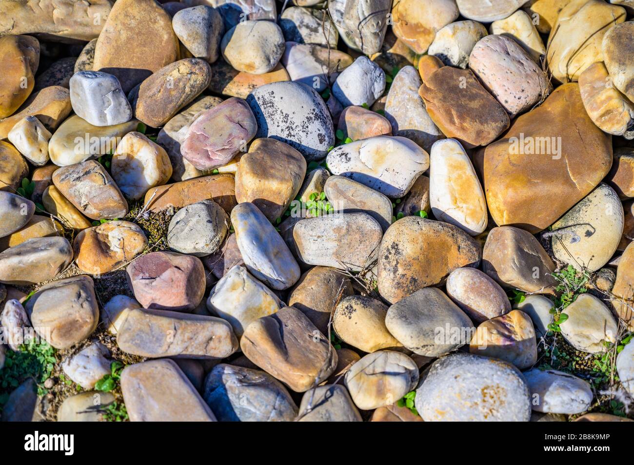 Wallpaper texture of many rocks Stock Photo - Alamy