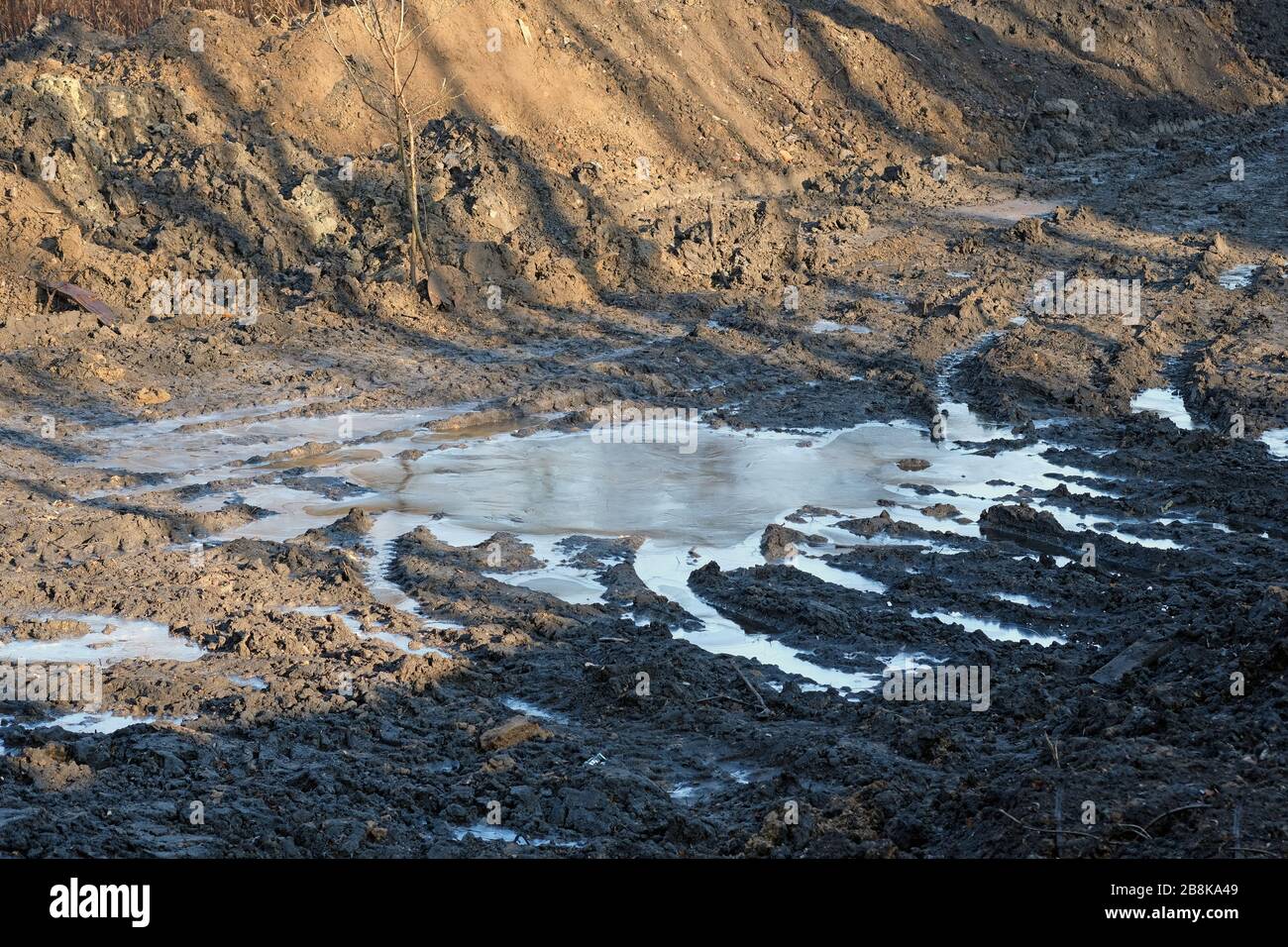 Deep puddle on a dirty road hi-res stock photography and images - Alamy