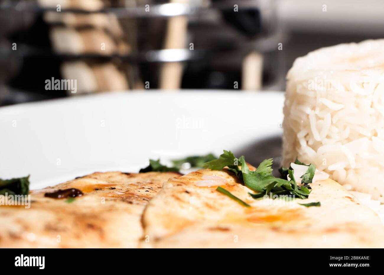 fillet and natural rice on a plate Stock Photo - Alamy