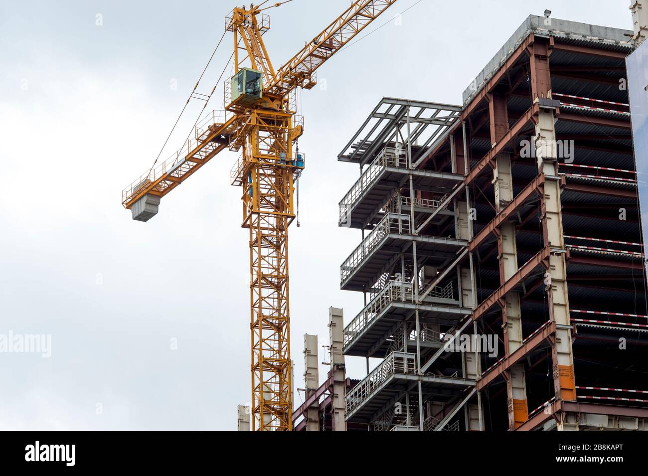 Construction of the frame of high-rise buildings against the overcast ...