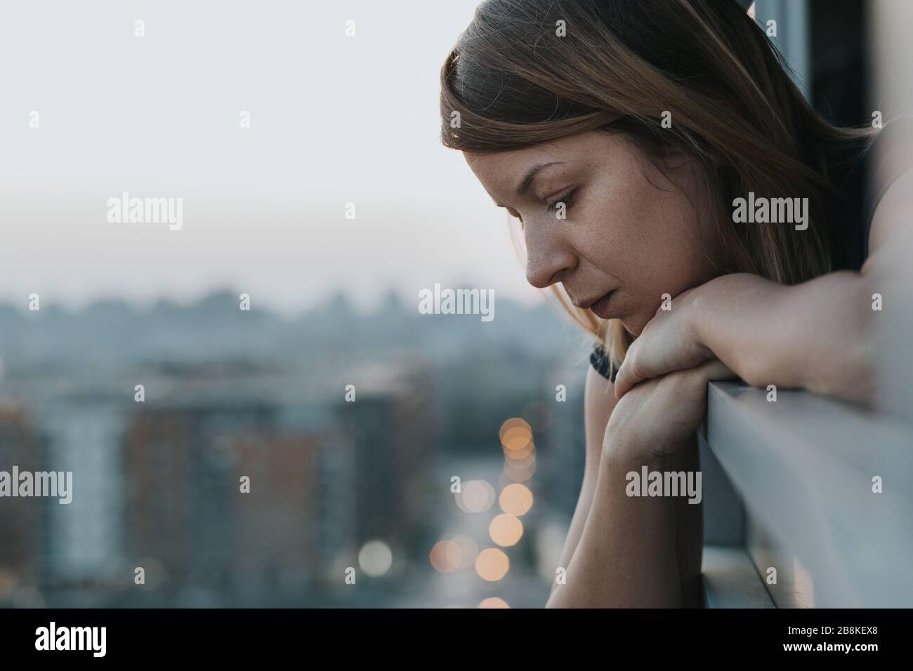 Sad Woman Looking Out Window