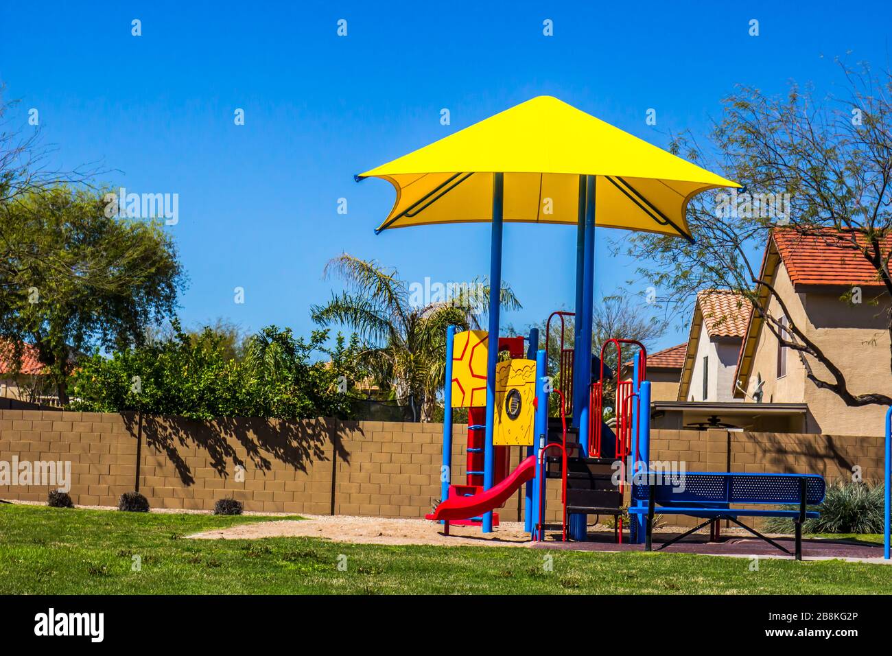 Covered Children's Playground Equipment With Slides Stock Photo - Alamy