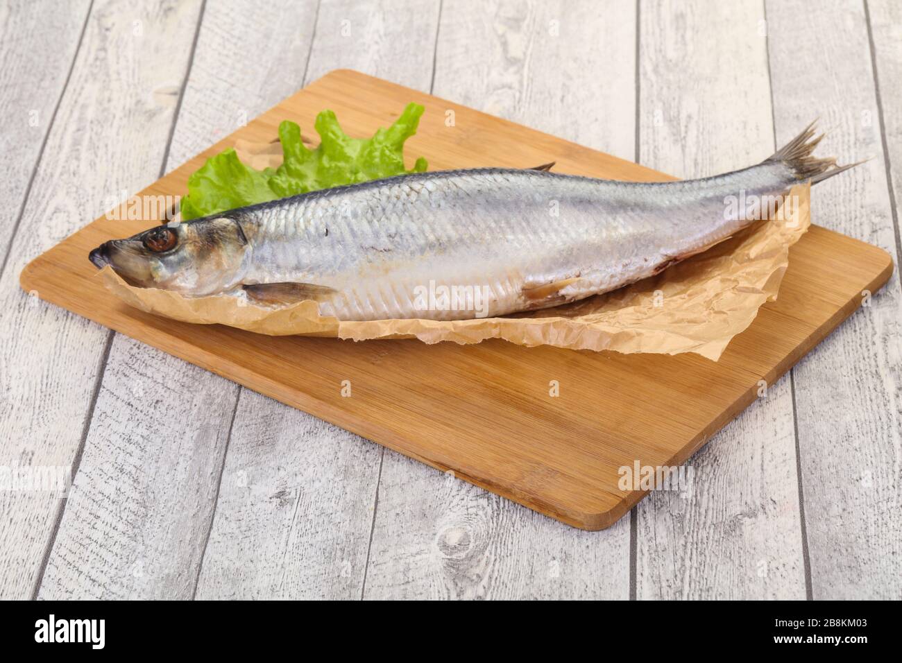 Salted herring fish ready for eat Stock Photo - Alamy