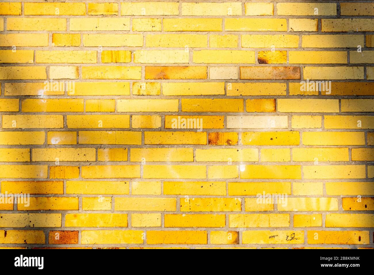 Section of an old partially weathered and polluted building wall of ...