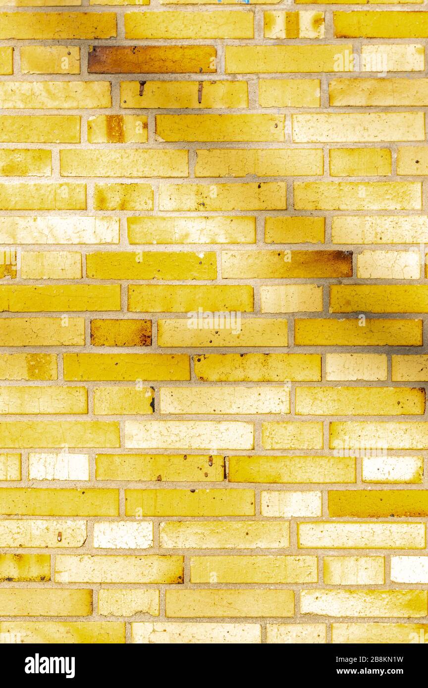 Section of an old partially weathered and polluted building wall of ...