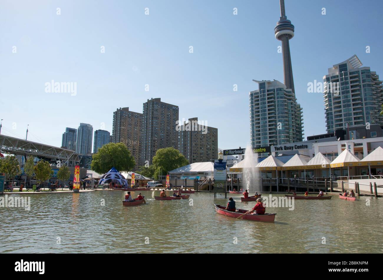 healthy lifestyle - paddling canoe in waterfront park (Toronto Stock ...