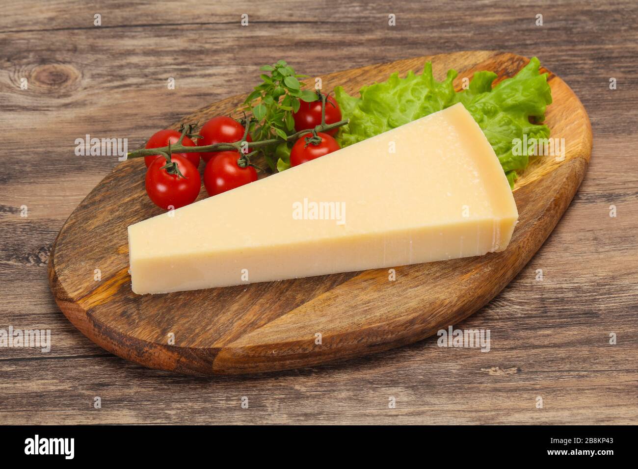 Italian traditional parmesan cheese triangle served salad Stock Photo ...