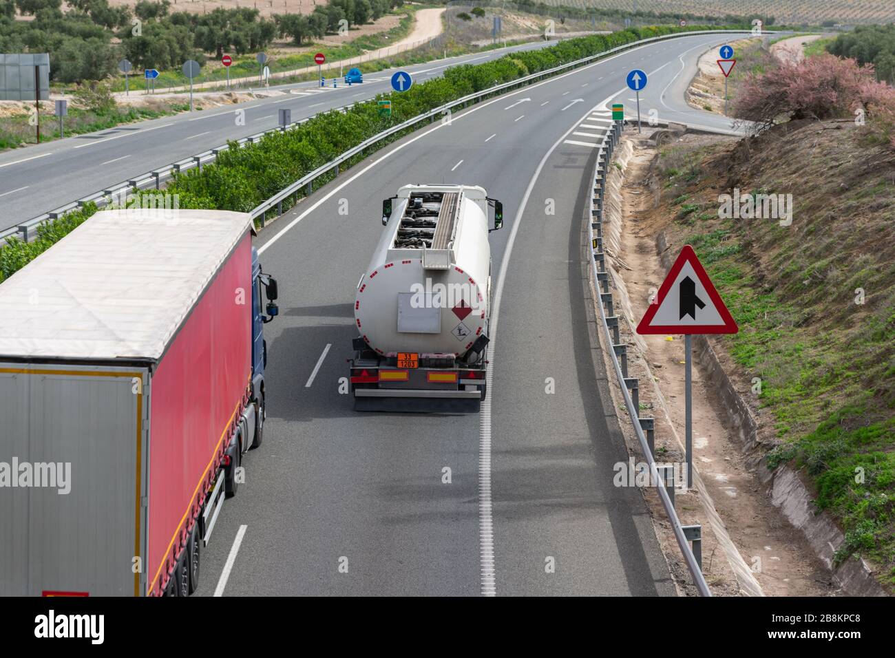 Tank truck with dangerous goods circulating on the highway Stock Photo ...