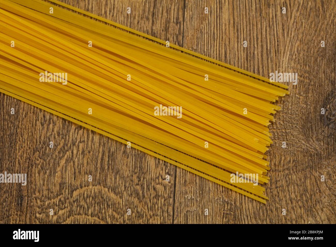Dry raw spaghetti ready for bowling Stock Photo - Alamy