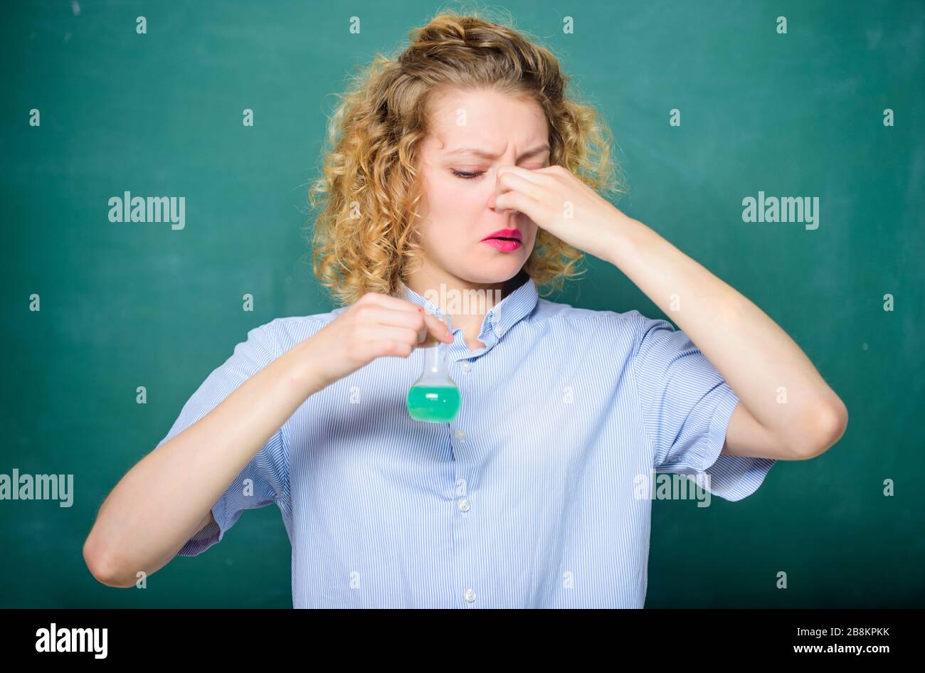 Girl student dislike chemistry. Student practicing on hateful lesson ...