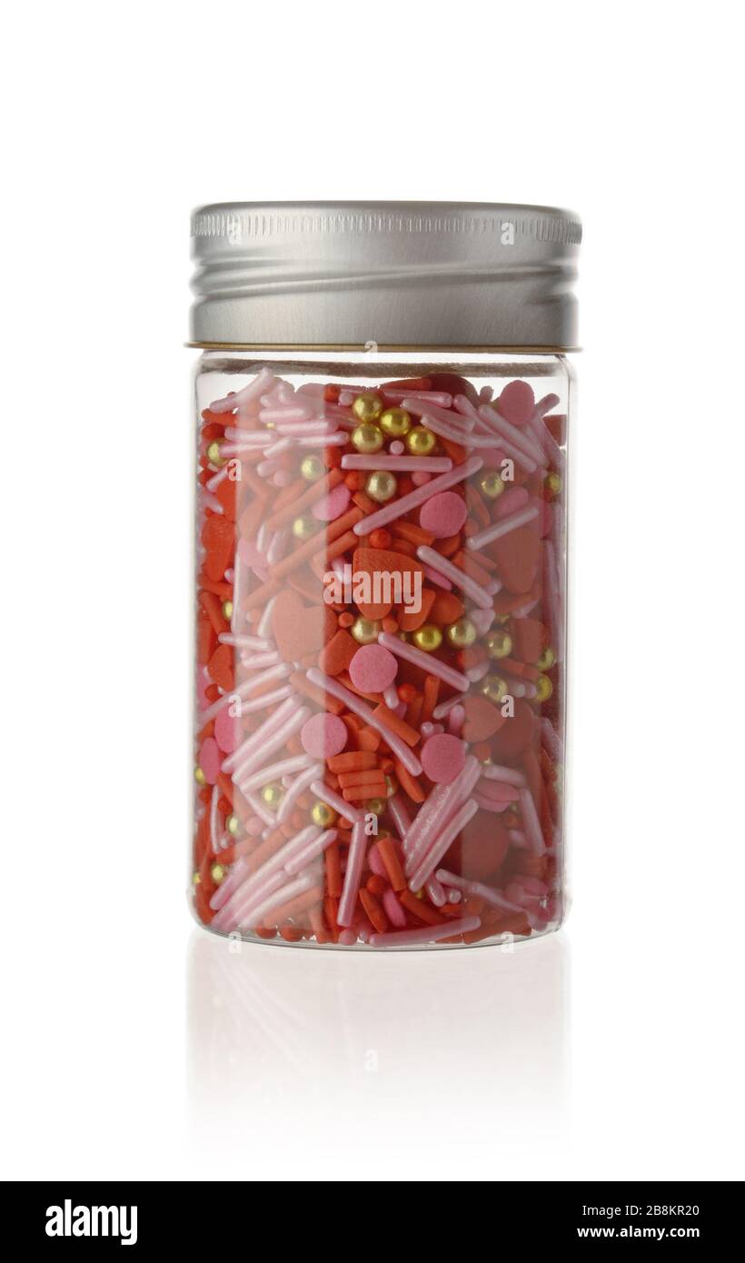 Full color topping sprinkle in glass bottle on isolated white ...
