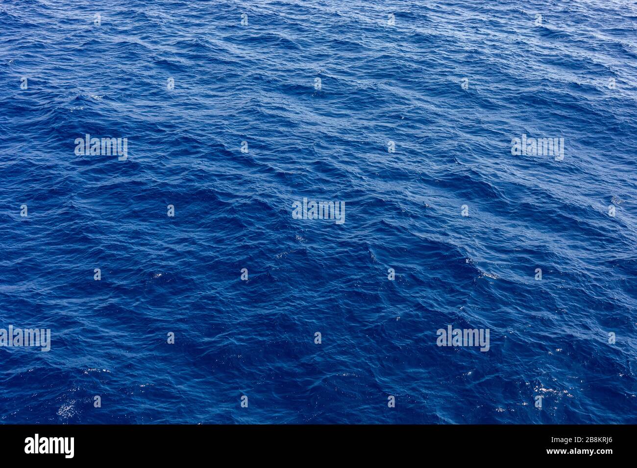 Blue sea water in calm. Clear blue sea - abstract background, wallpaper ...