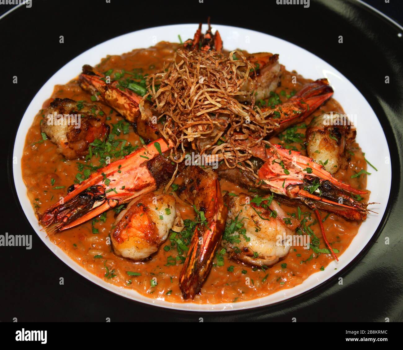 grilled king tiger prawns risotto, rice cooked in rich flavoured rock ...