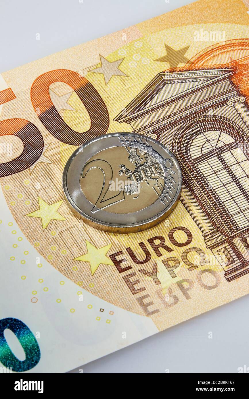 50 Euro currency banknote and 2 Euro coin, EU Stock Photo - Alamy