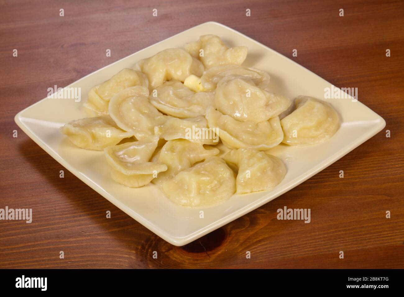 Homemade dumplings with mashed potato and butter Stock Photo - Alamy