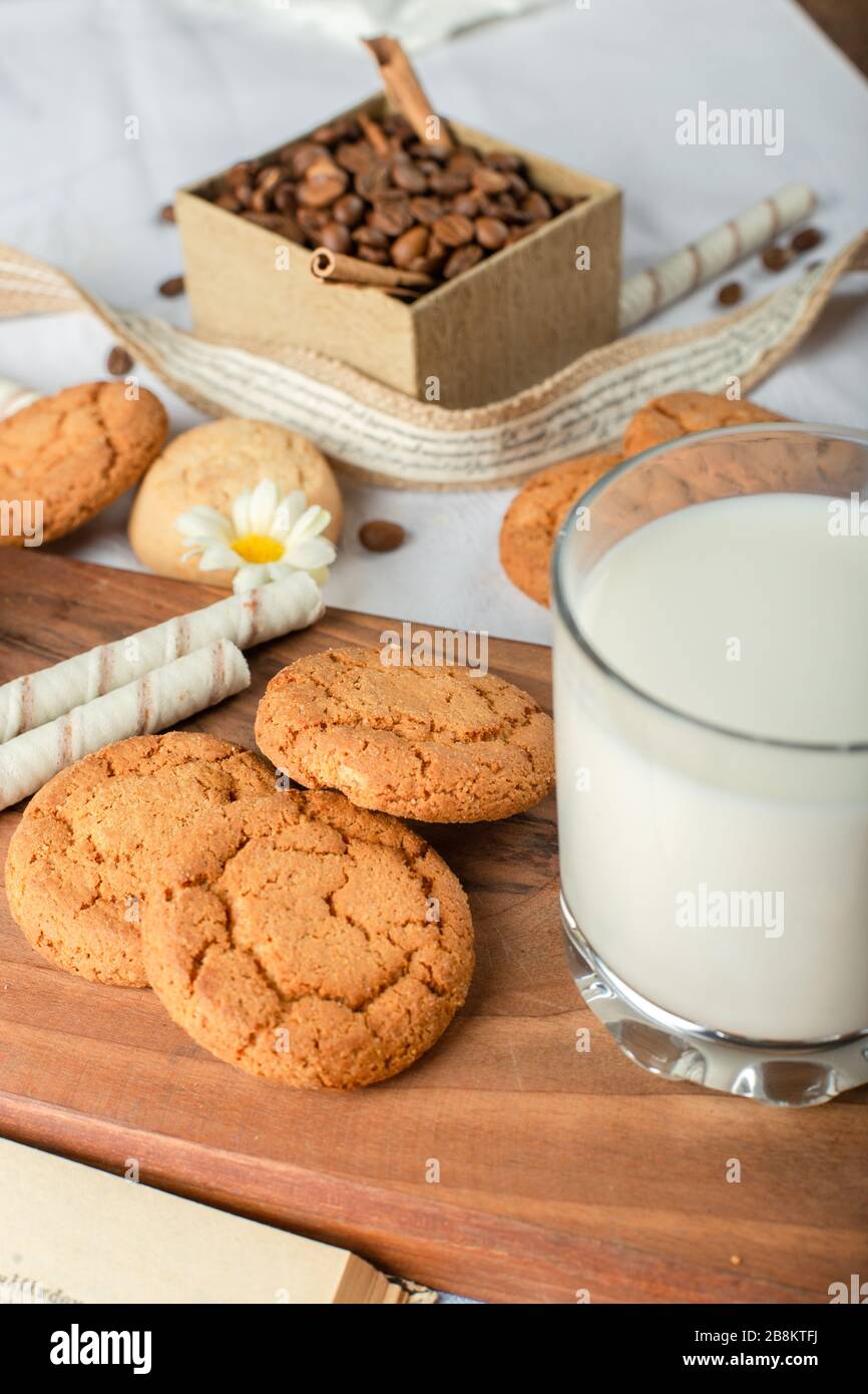 Sweet butter cookies and a cup of milk Stock Photo - Alamy
