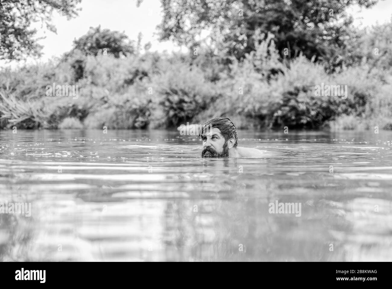 Submerge into water. Freshness of wild nature. Summer vacation. Deep ...