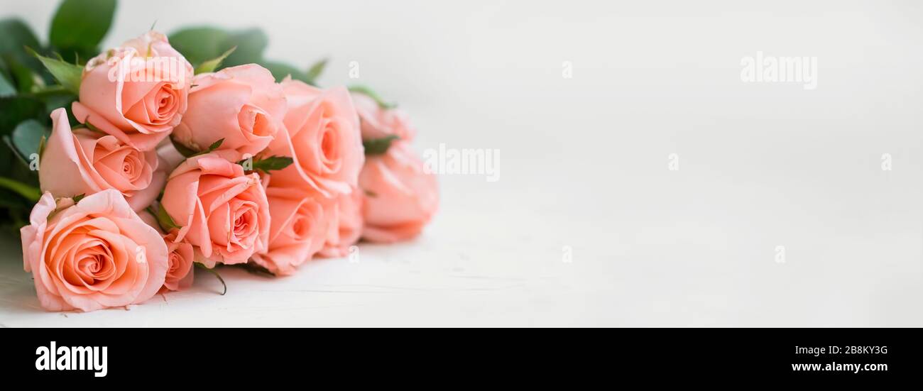 Pink roses bouquet with copy space background Stock Photo - Alamy