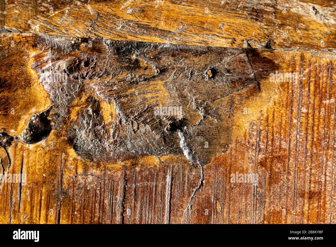 Brown wood texture of old wooden table with many scratches and marks of ...