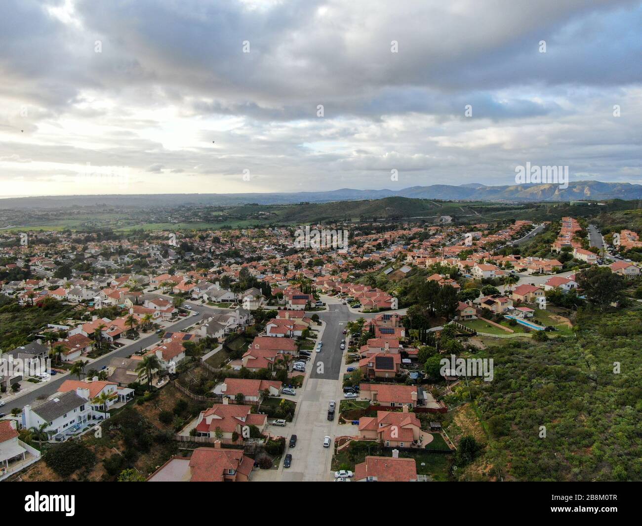 Aerial view of upper middle class neighborhood with residential ...