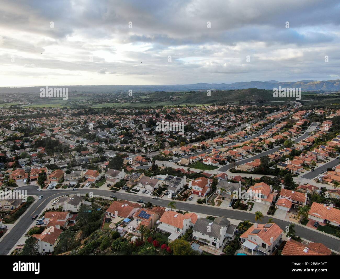 Aerial view of upper middle class neighborhood with residential ...
