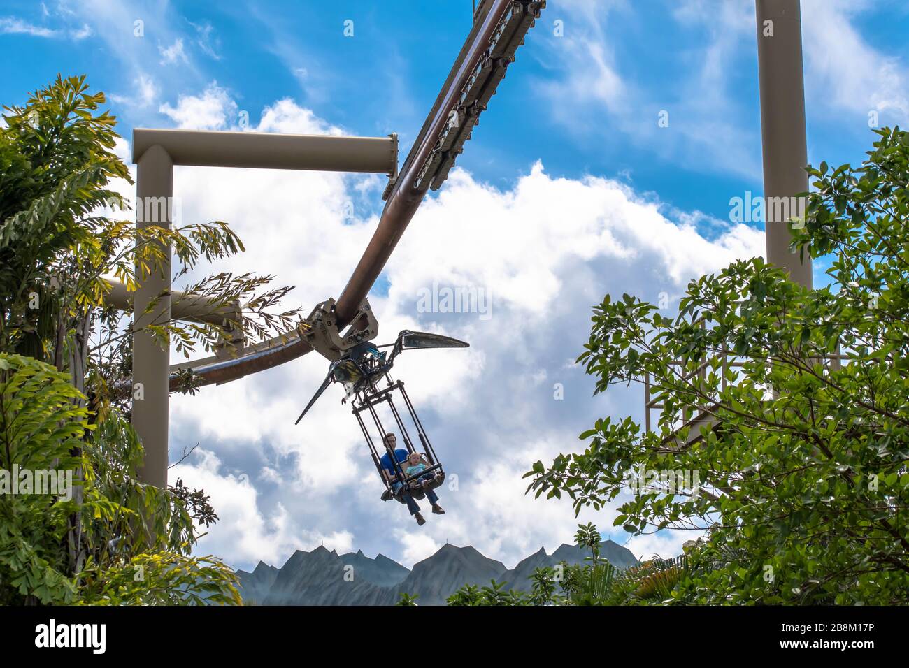 Orlando, Florida. March 02, 2019. People having fun Pteranodon Flyers ...