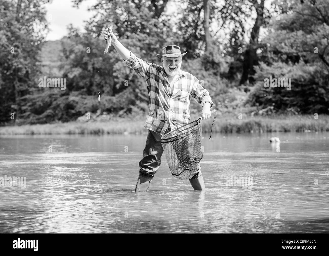 Old man fish farming Black and White Stock Photos & Images - Alamy