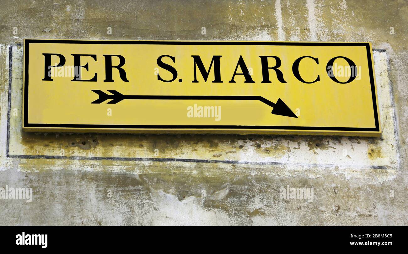 Road sign in Venice in Italy with directions to Square of Saint Mark ...