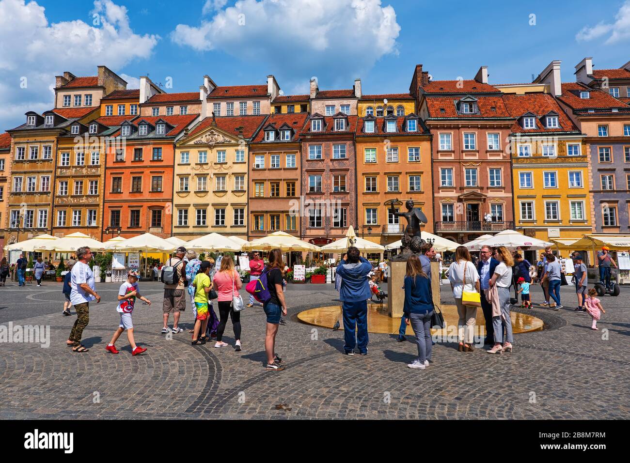 Warsaw, Poland - May 25, 2019: Group of people both local and tourists ...