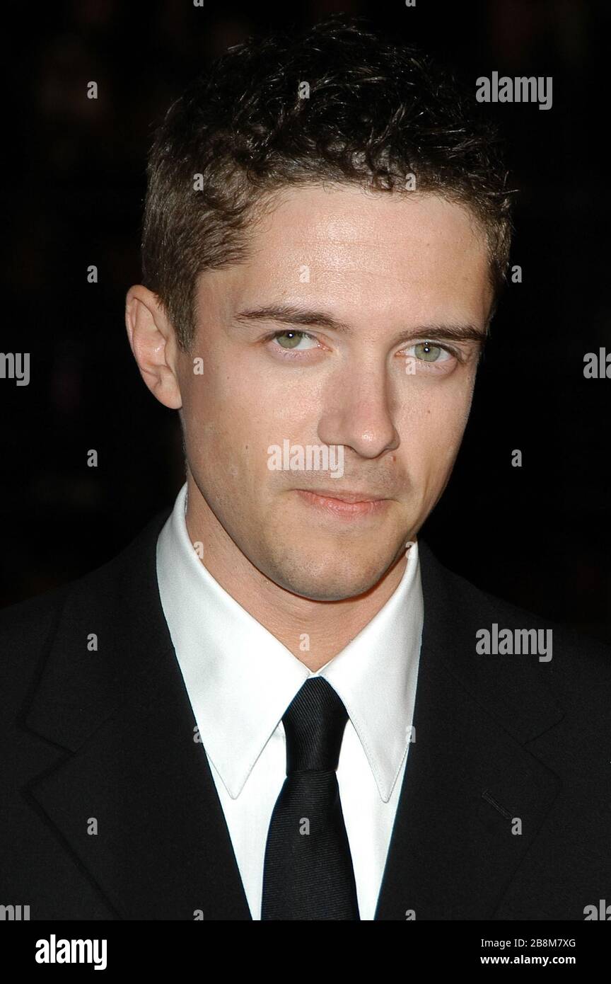 Topher Grace at the "Ocean's Twelve" Premiere held at Mann Grauman's ...